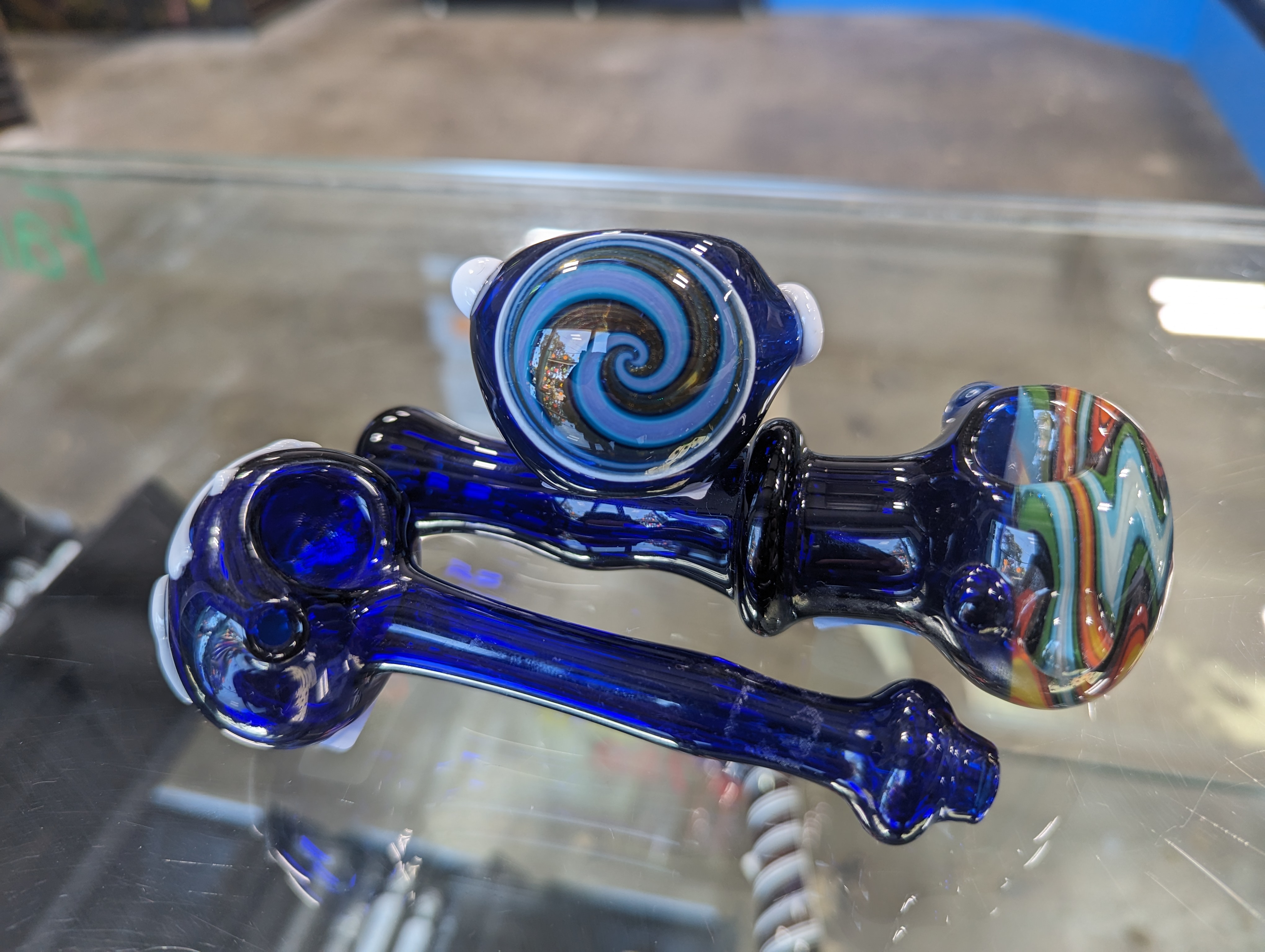 Blue pipe with custom design | Kure Wellness | Medical and Recreational ...